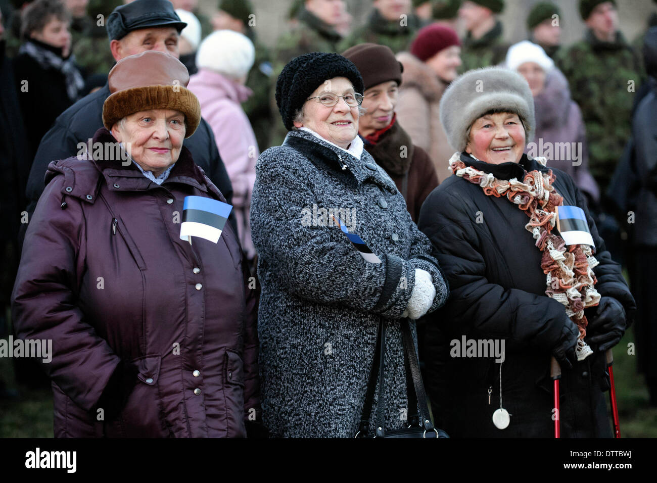 Narva, Estonia. 24th February 2014. People attend sunrise flag ceremony ...