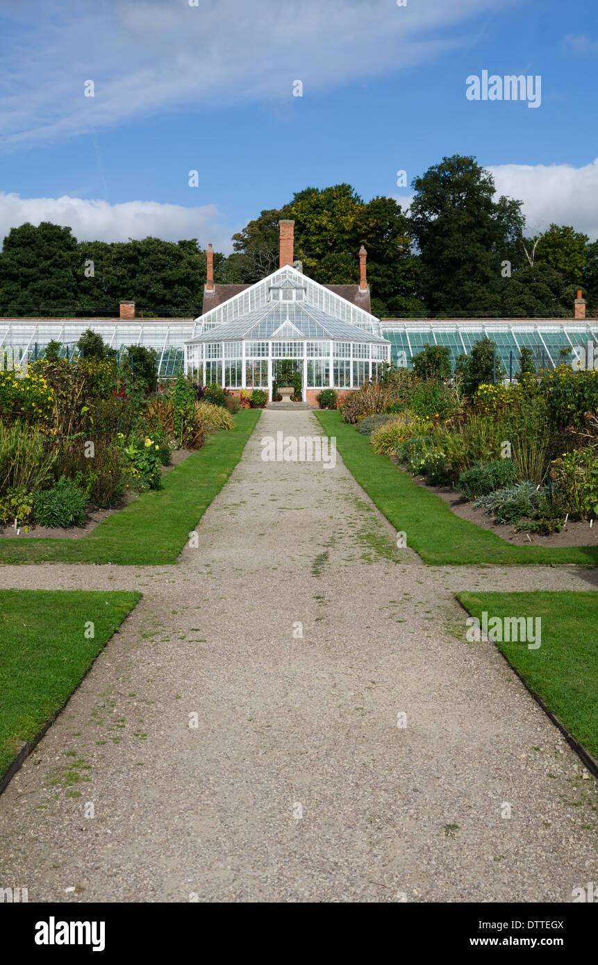 Large English Glasshouse in a garden Stock Photo - Alamy