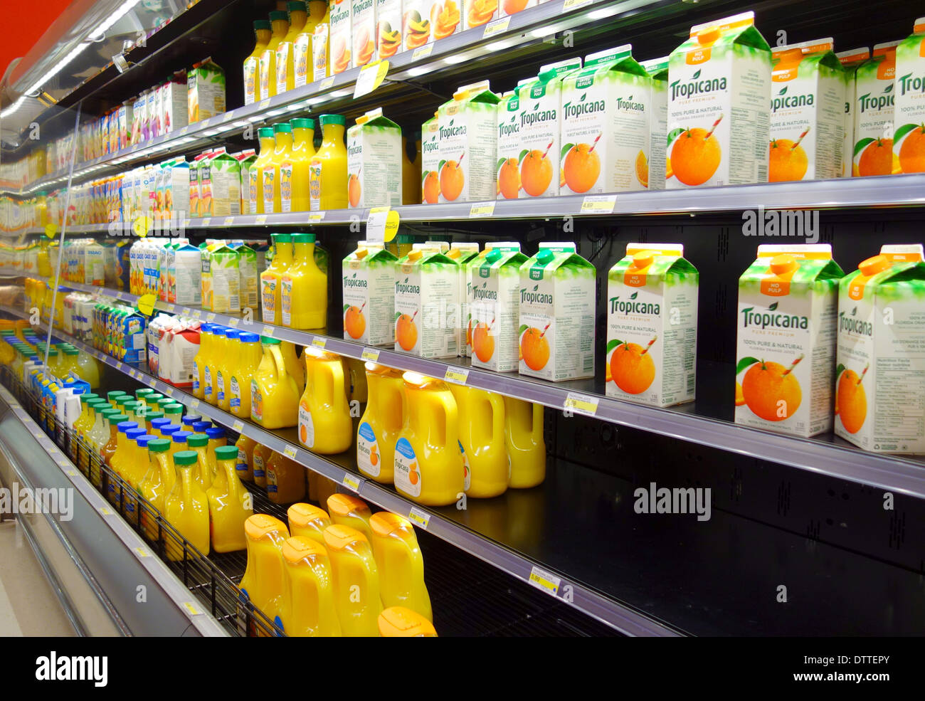 Orange juice jugs and cartons in a supermarket in Toronto, Canada Stock ...