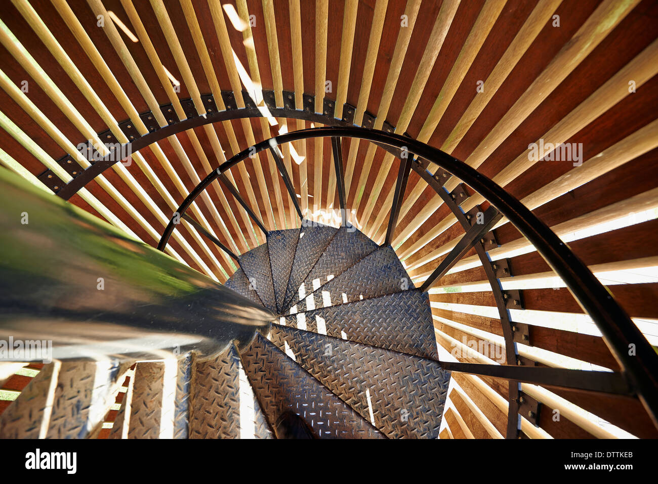Metal modern spiral staircase details with wooden structure Stock Photo ...