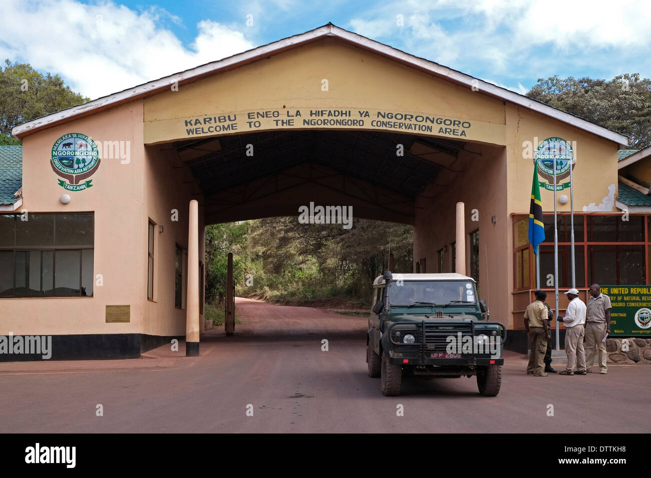 A Jeep crossing Loduare southernmost entrance gate into the Ngorongoro ...