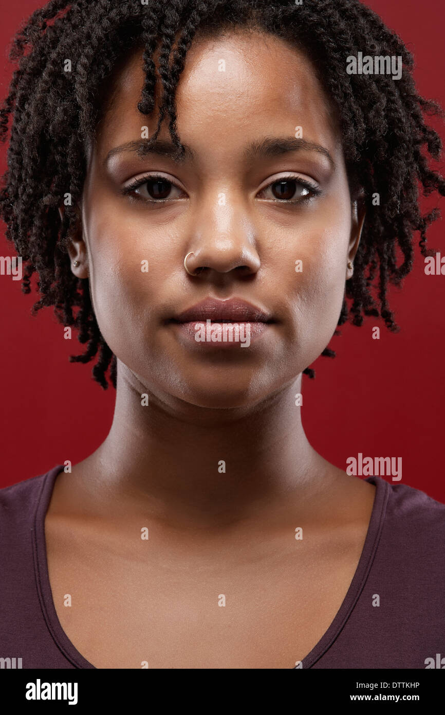 Black woman's serious face Stock Photo - Alamy