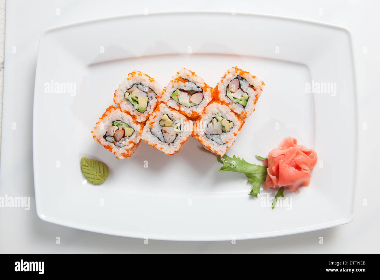 Maki Sushi on plate isolated on white Stock Photo - Alamy
