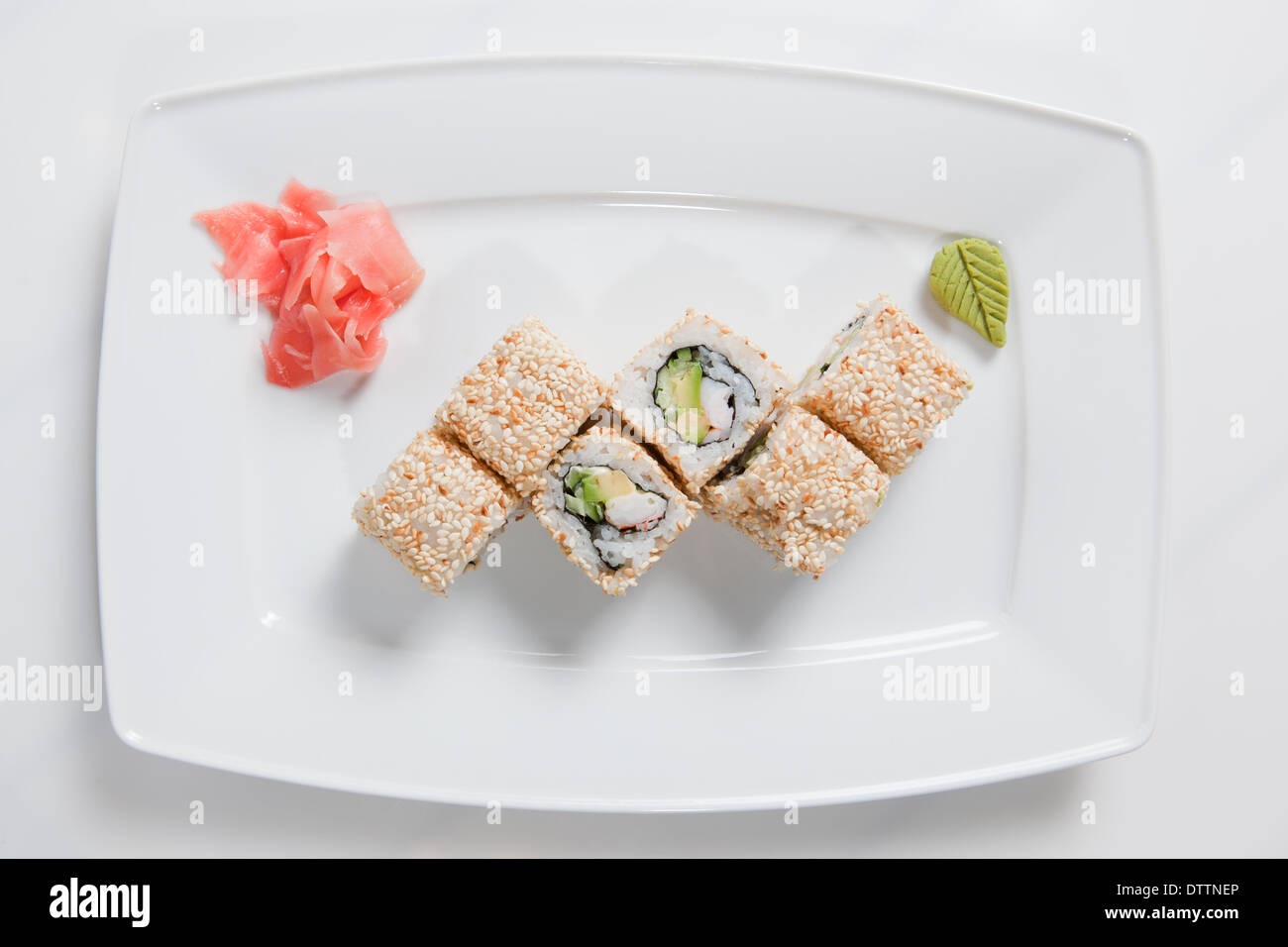 Maki Sushi on plate isolated on white Stock Photo - Alamy