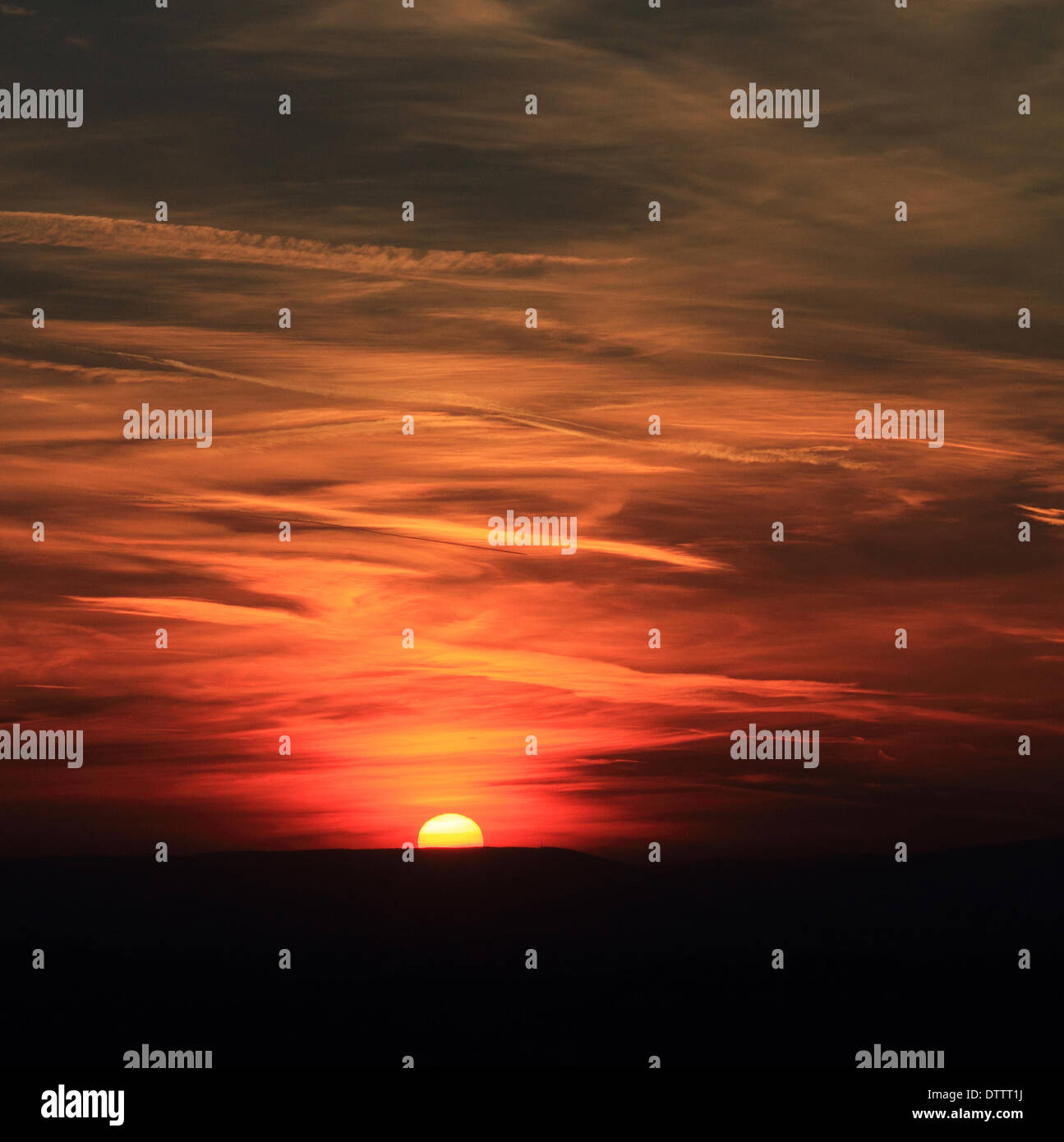 Red sunset sky stormy clouds Stock Photo - Alamy