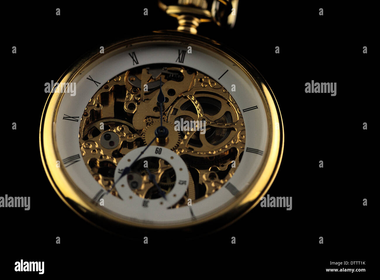 Old watch machine on dark background Stock Photo - Alamy