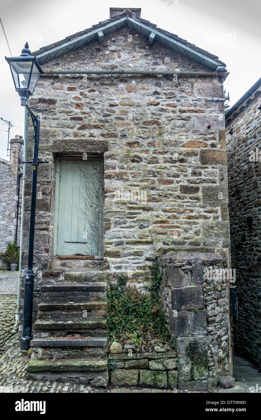 Old stone cottage with steep steps leading to door Stock Photo - Alamy