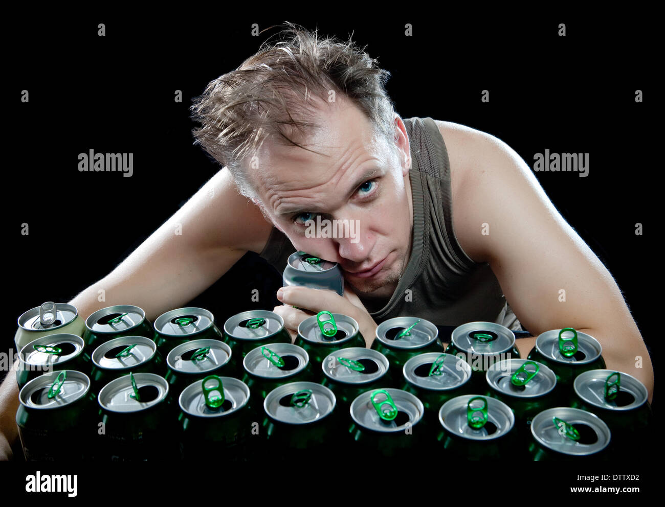 Unhealthy man and beer cans Stock Photo - Alamy