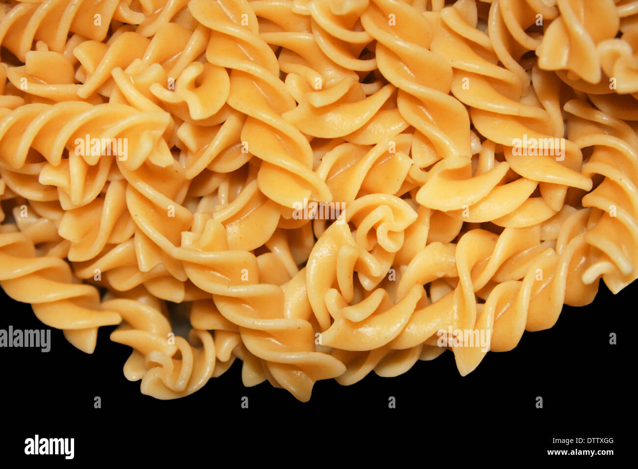 Whole grain spiral pasta Stock Photo - Alamy