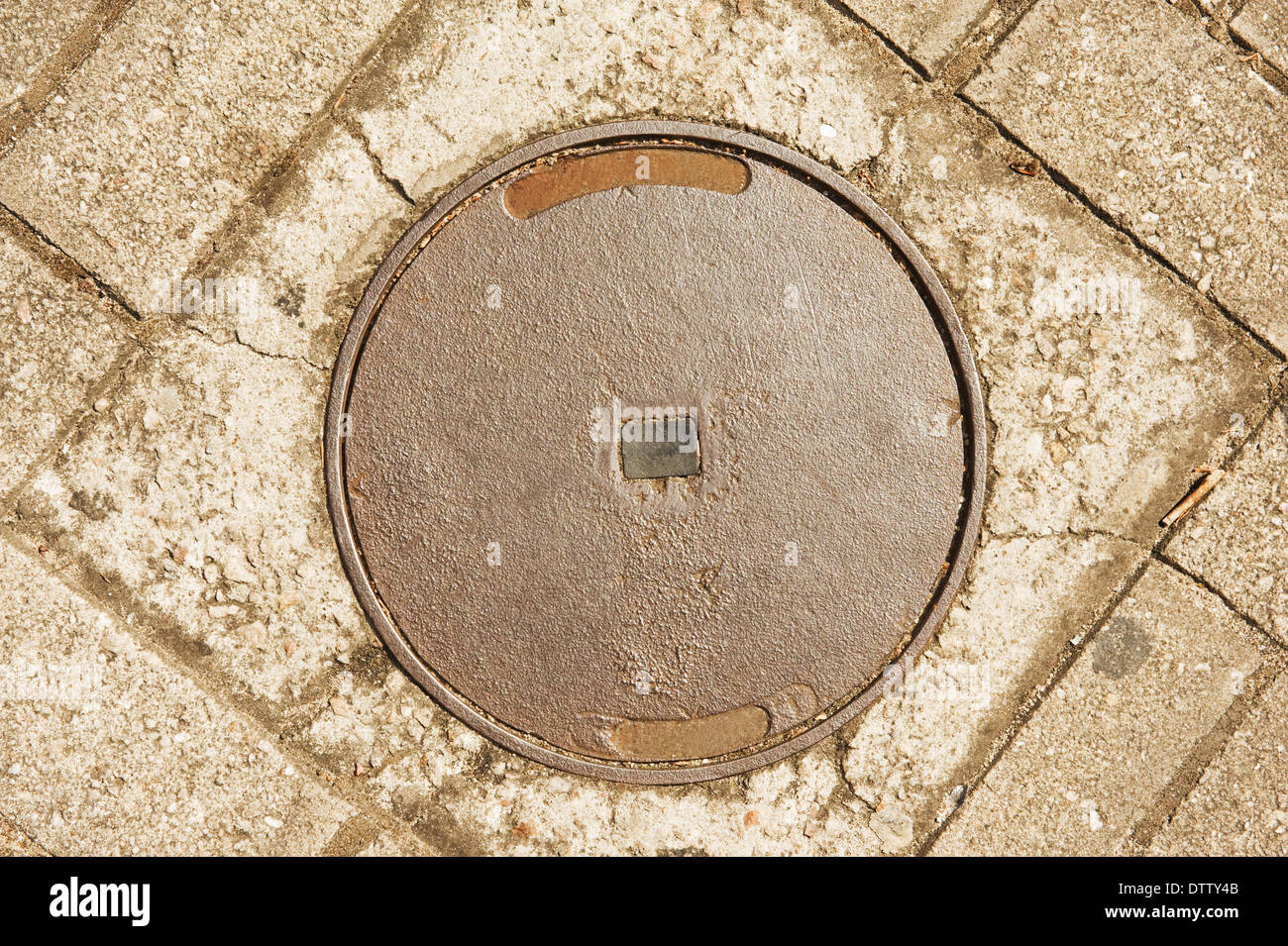 Rusted metal manhole cover hi-res stock photography and images - Alamy