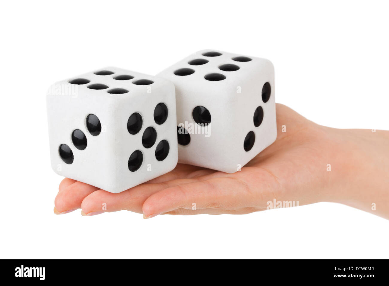 Two dices in hand Stock Photo - Alamy