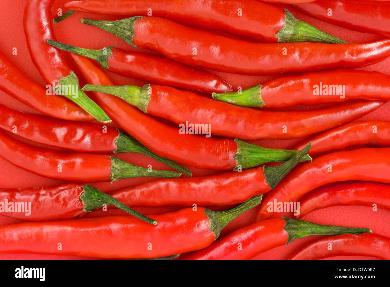 Red hot chili pepper background Stock Photo - Alamy