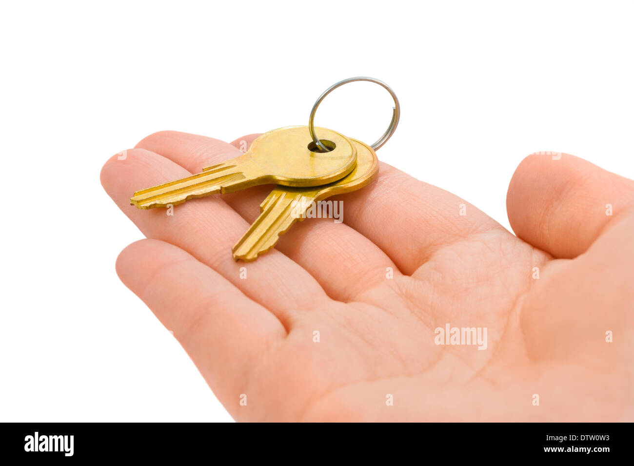 Hand giving keys Stock Photo - Alamy