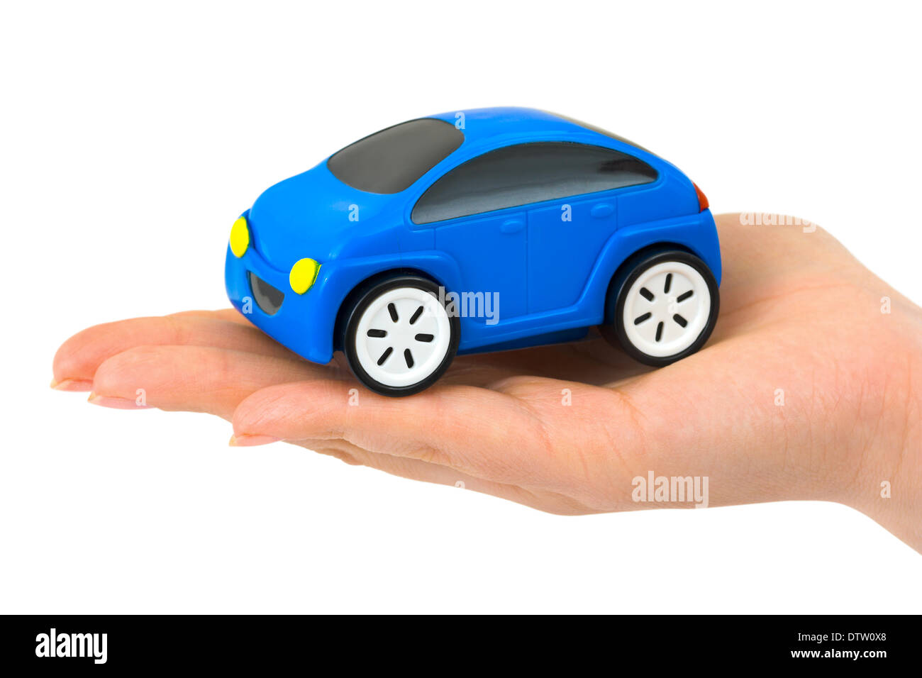 Hand and toy car Stock Photo - Alamy