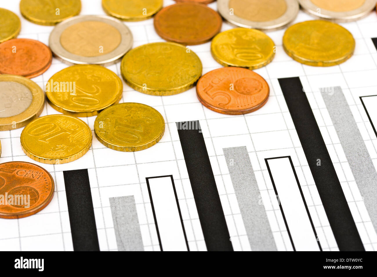 Coins and diagram Stock Photo - Alamy