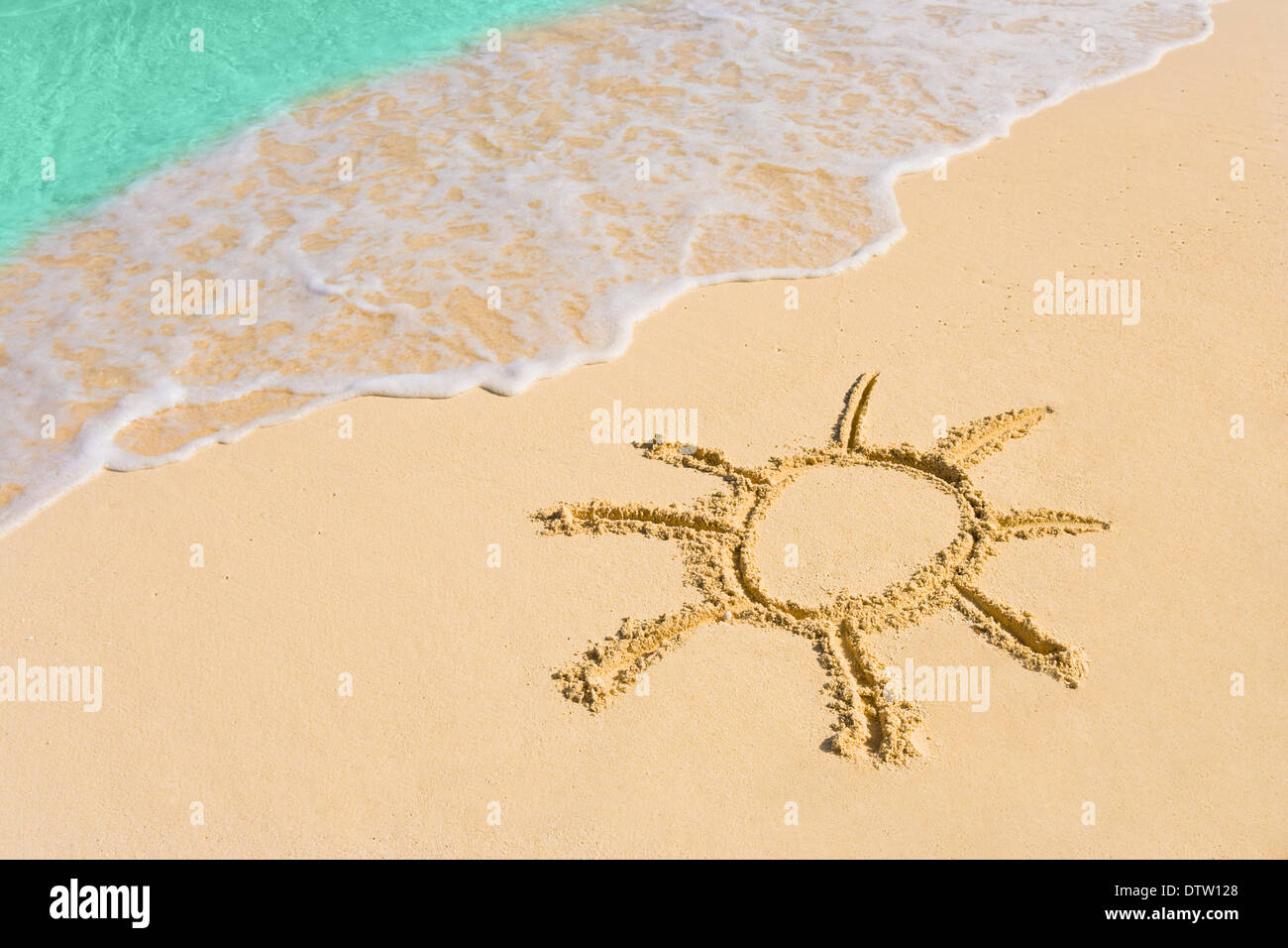 Drawing sun on beach Stock Photo - Alamy