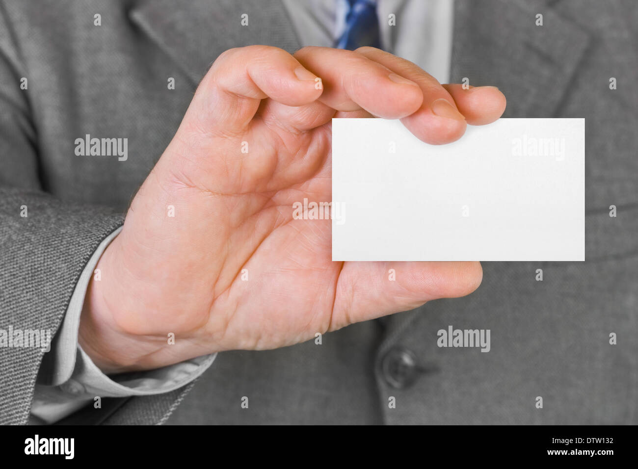 Paper card in hand Stock Photo - Alamy