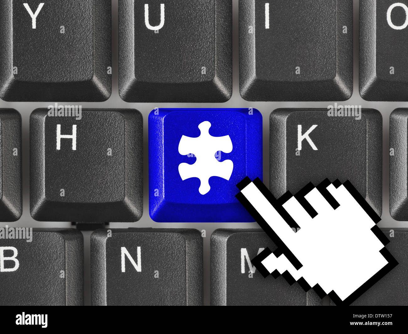 Computer keyboard with puzzle key Stock Photo - Alamy