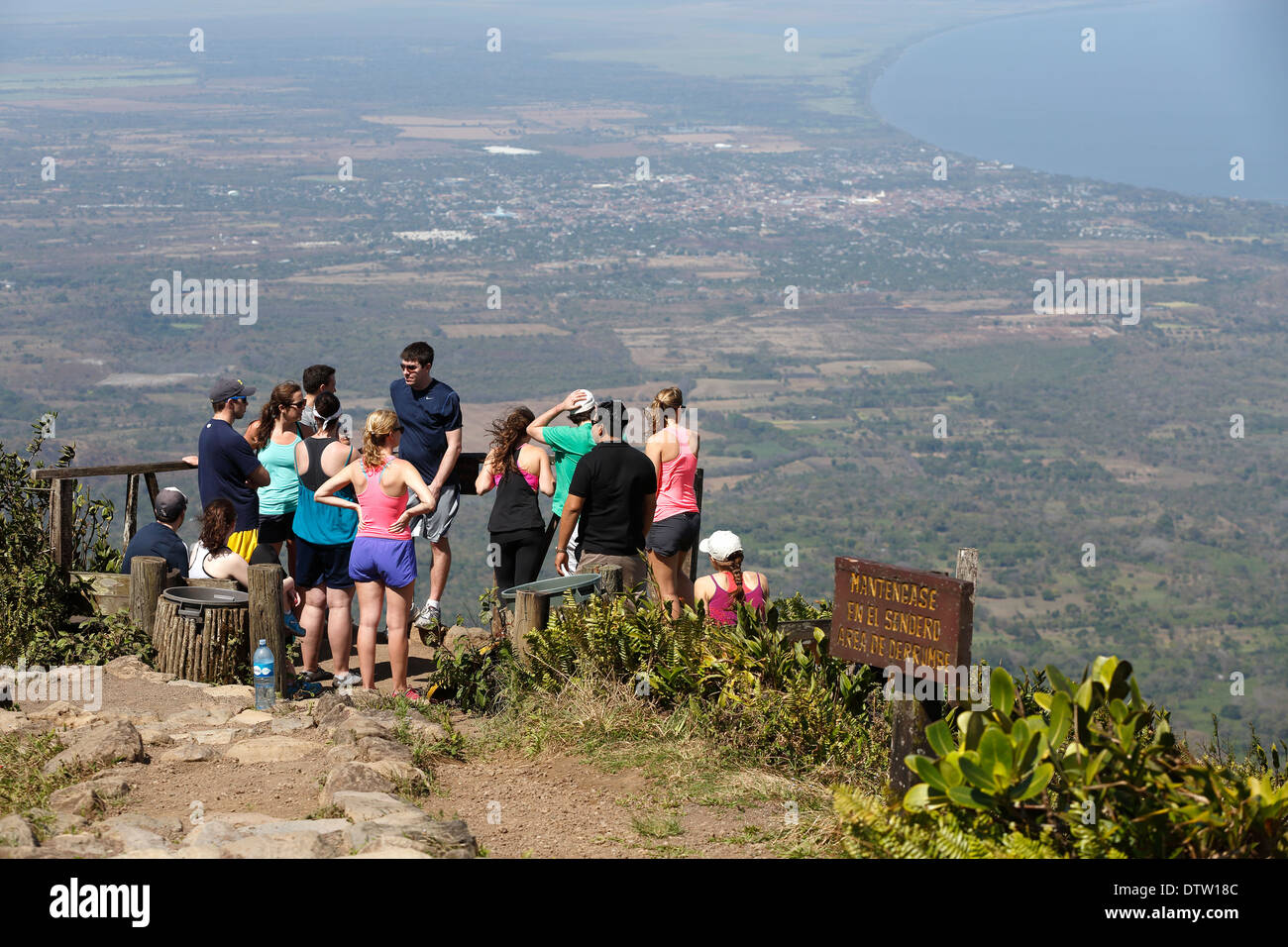 Tourists, scenic overlook with view of Granada on Mombacho volcano ...