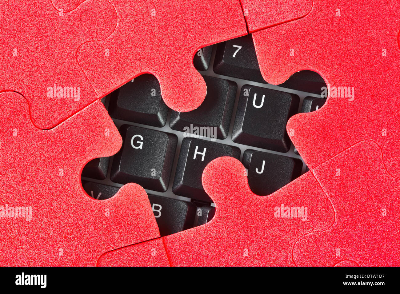 Puzzle and computer keyboard Stock Photo - Alamy