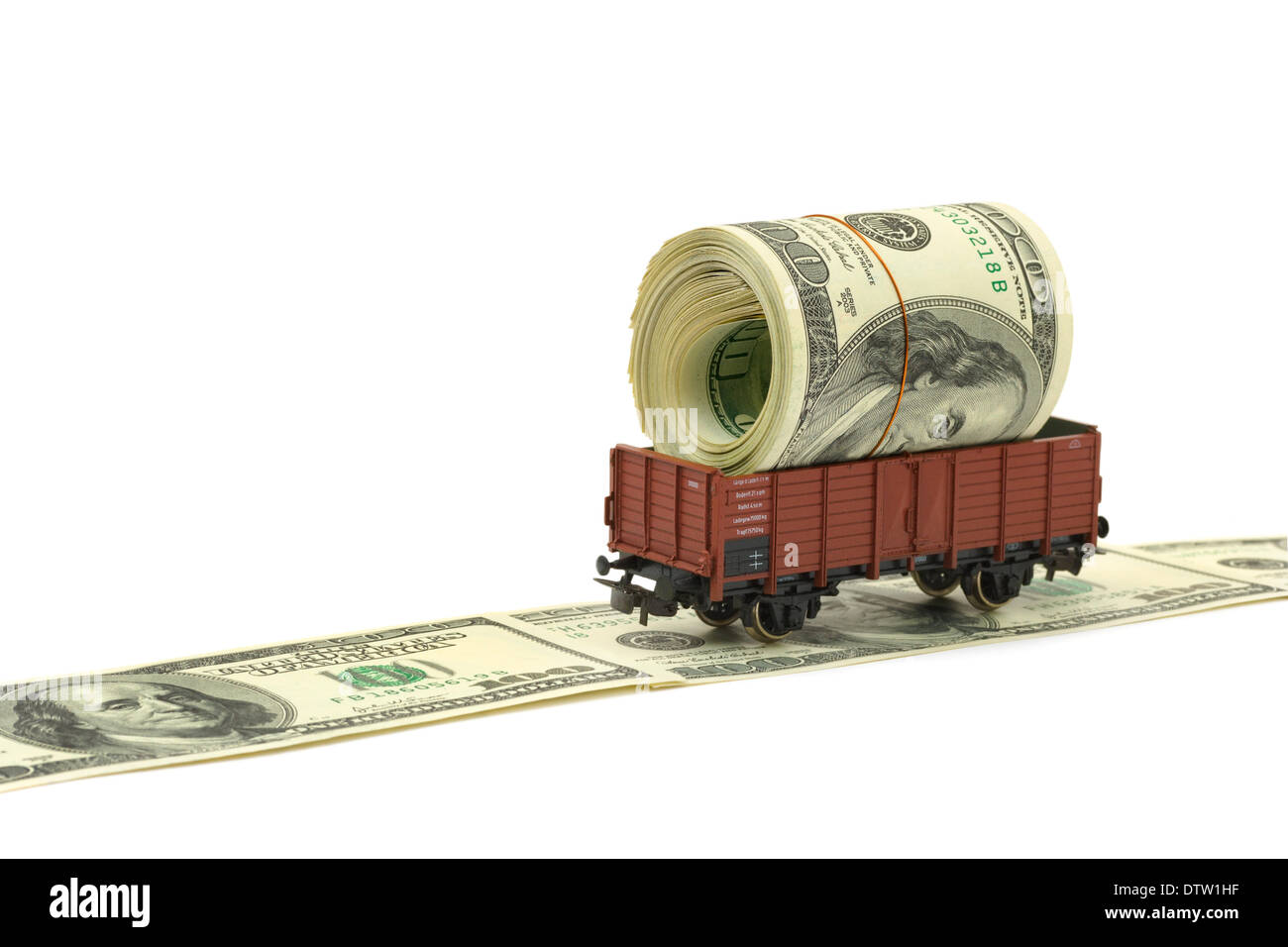 Train with money Stock Photo - Alamy