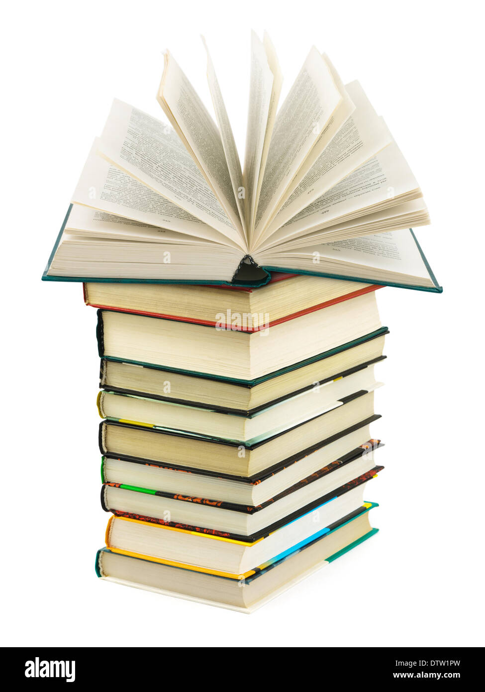 Opened book on stack Stock Photo - Alamy