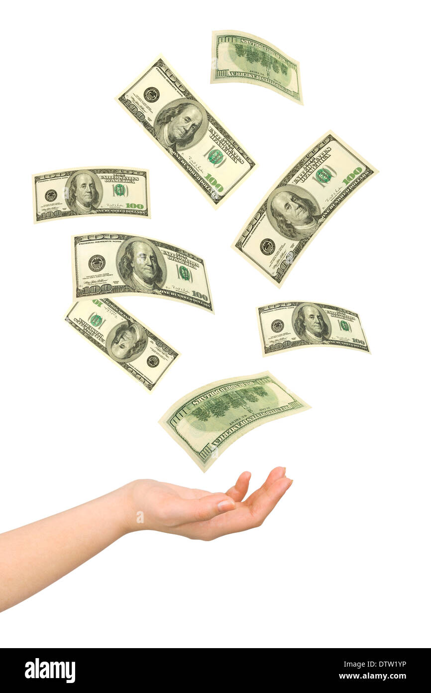 Hand and falling money Stock Photo - Alamy