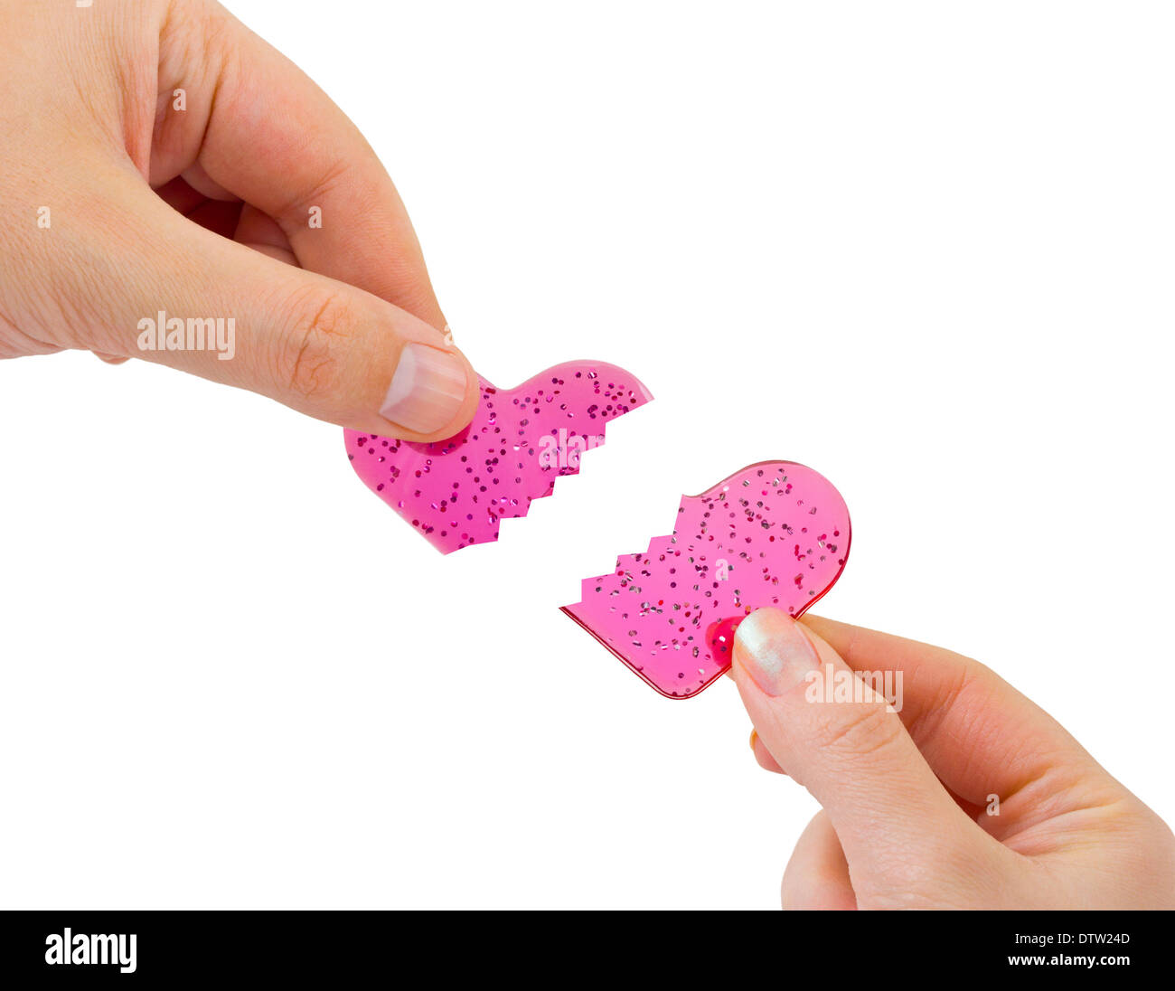 Man and woman hands with breaking heart Stock Photo - Alamy