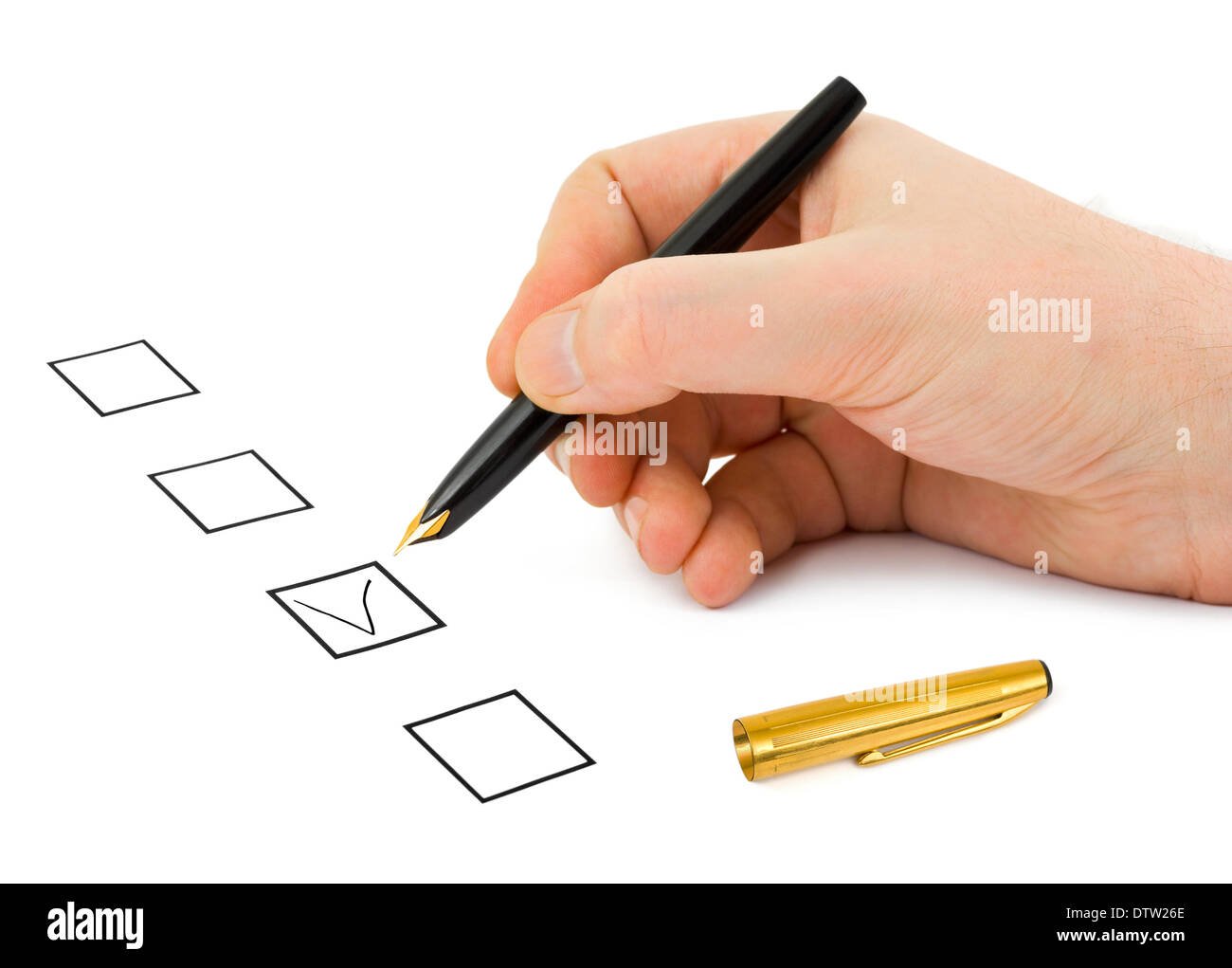 Hand with pen and check boxes Stock Photo - Alamy