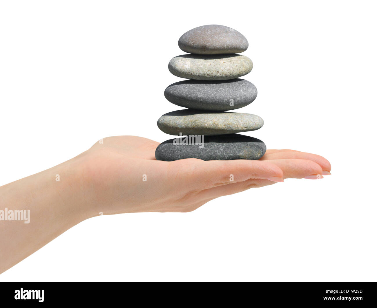 Stack of stones in hand Stock Photo - Alamy