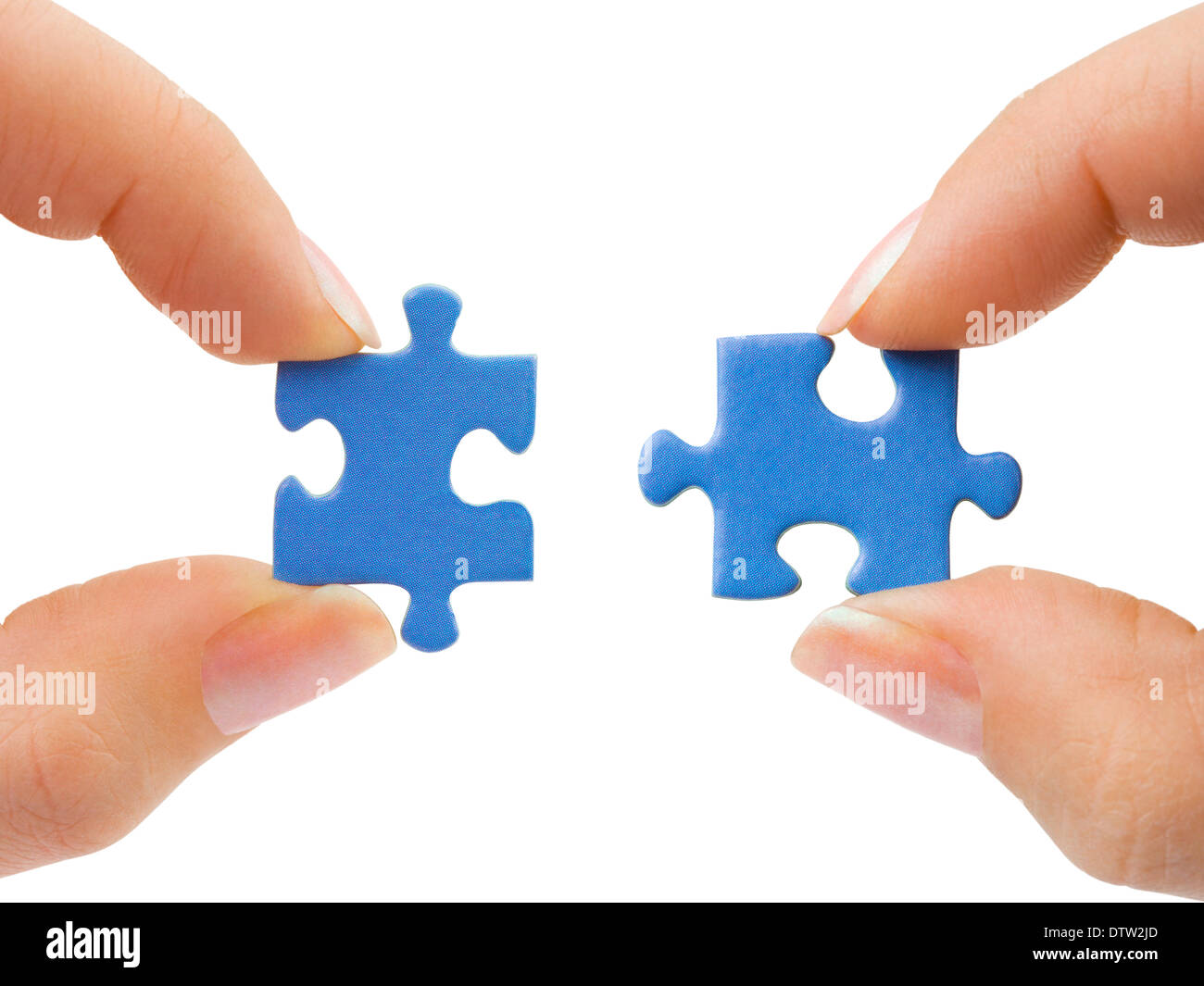 Hands and puzzle Stock Photo - Alamy