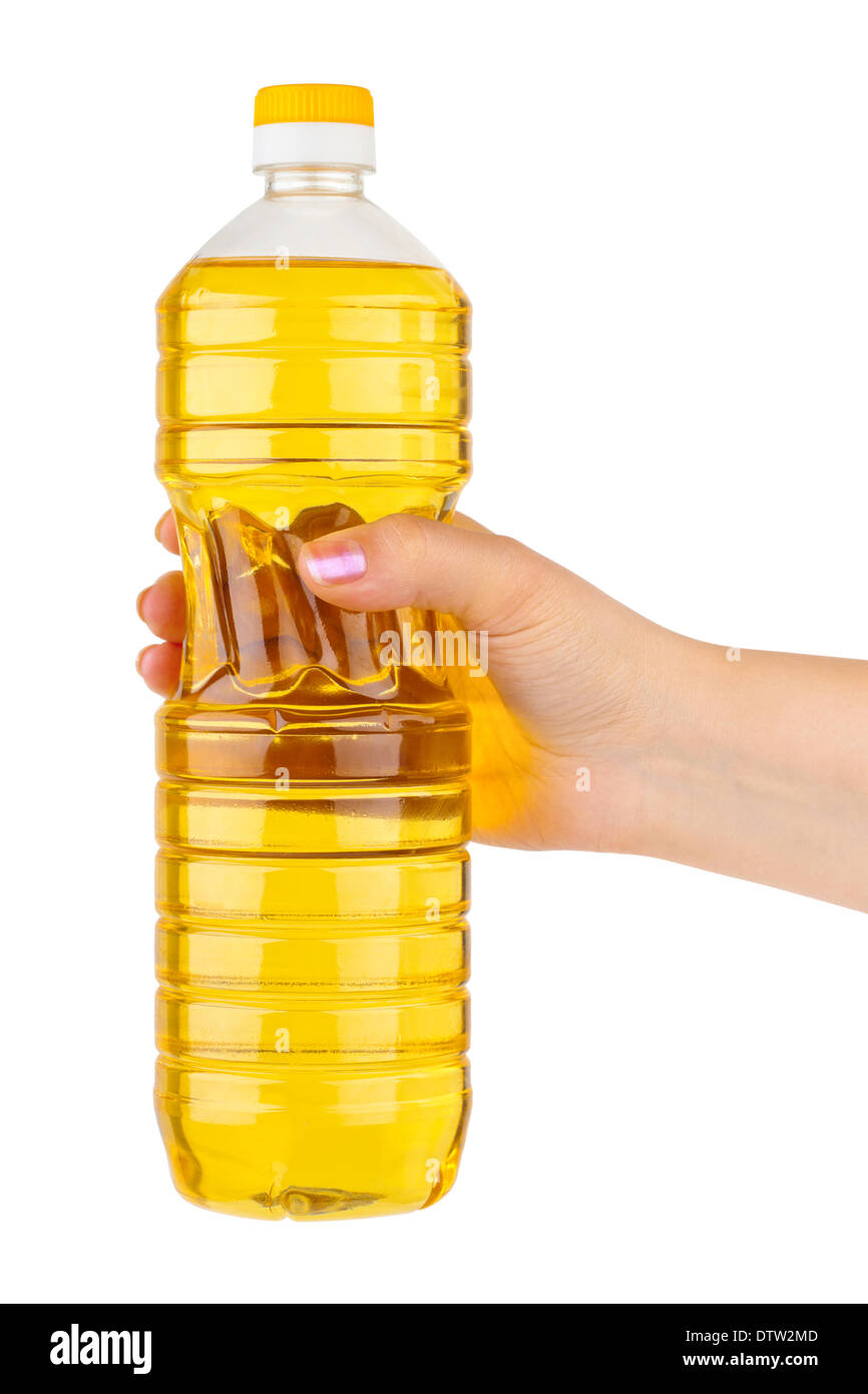 Hand with bottle of cooking oil Stock Photo - Alamy