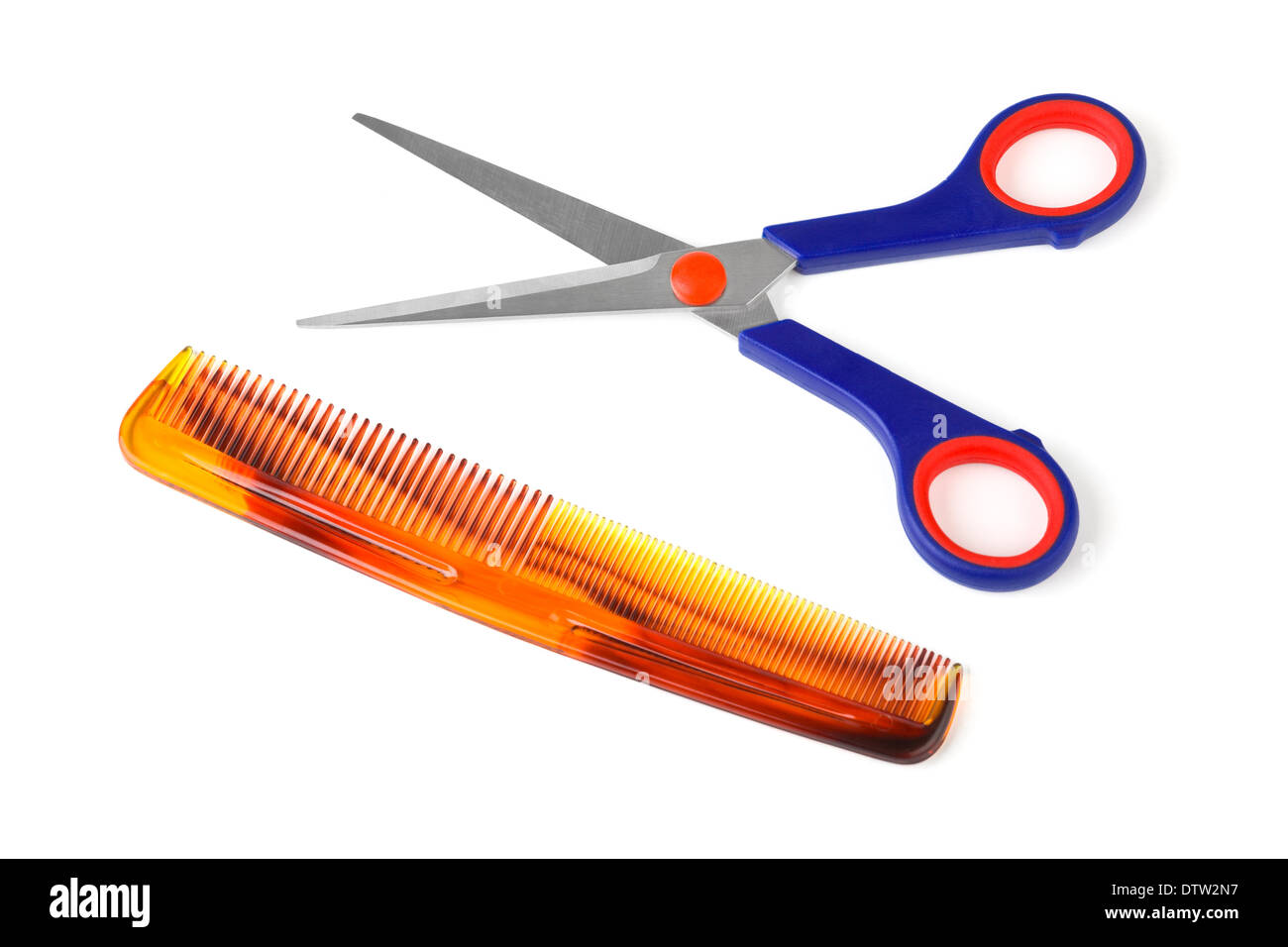 Scissors and comb Cut Out Stock Images & Pictures - Alamy