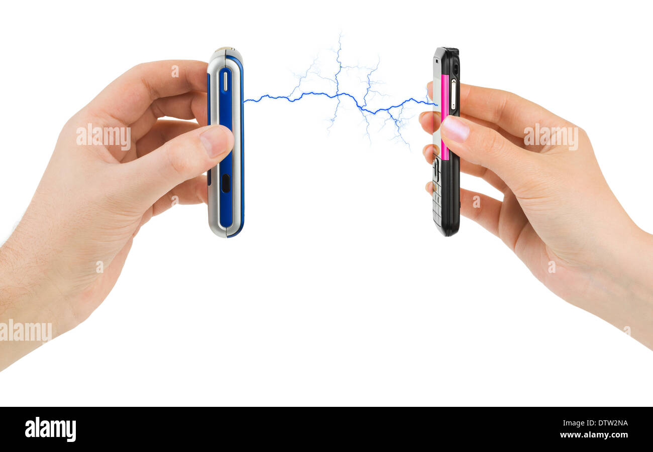 Hands and connected mobile phones Stock Photo - Alamy