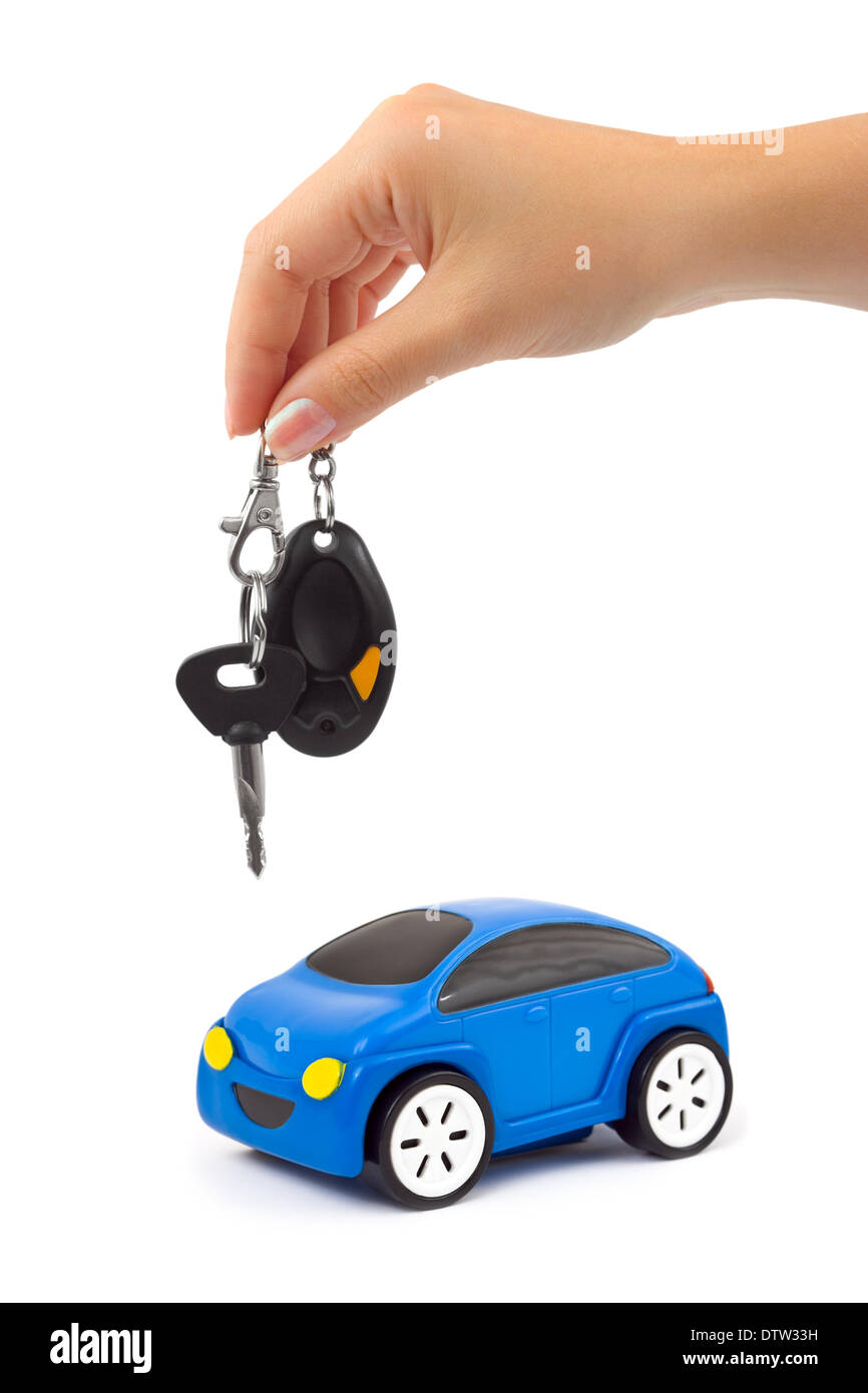 Hand with key and car Stock Photo - Alamy
