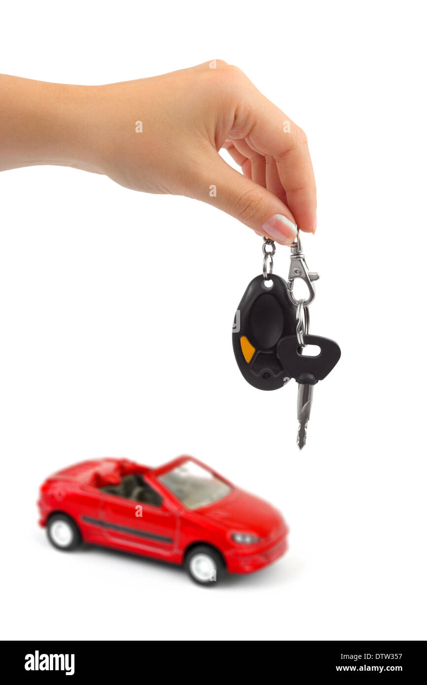 Woman buying car key Cut Out Stock Images & Pictures - Alamy