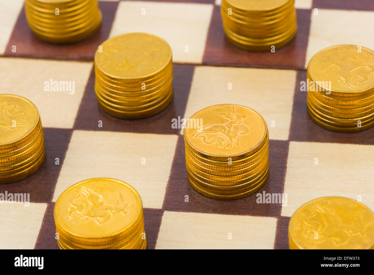 Money on chess board Stock Photo - Alamy