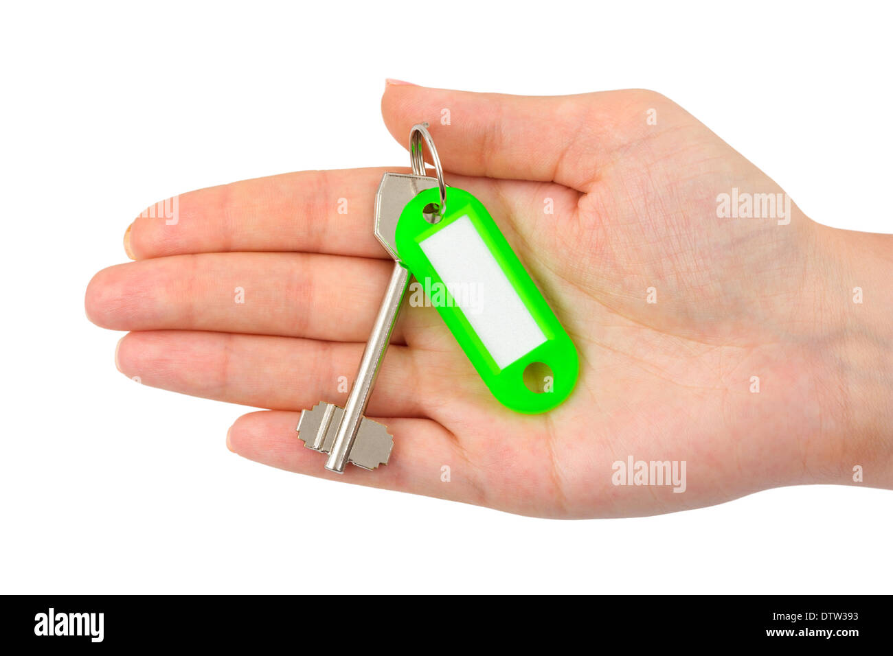 Hand and key with label Stock Photo - Alamy