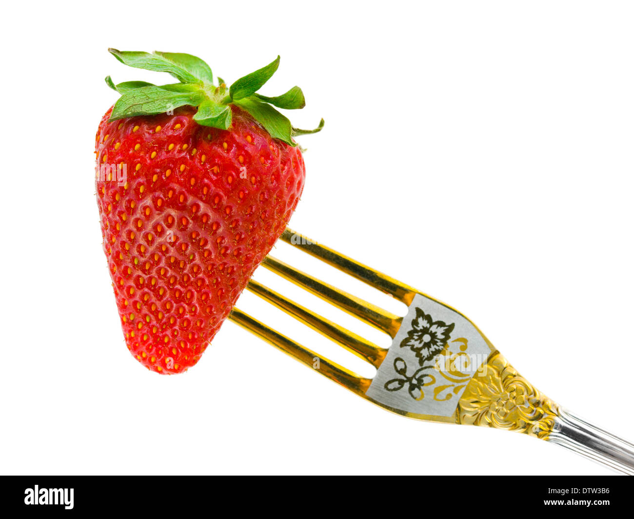 Strawberry and fork Stock Photo - Alamy