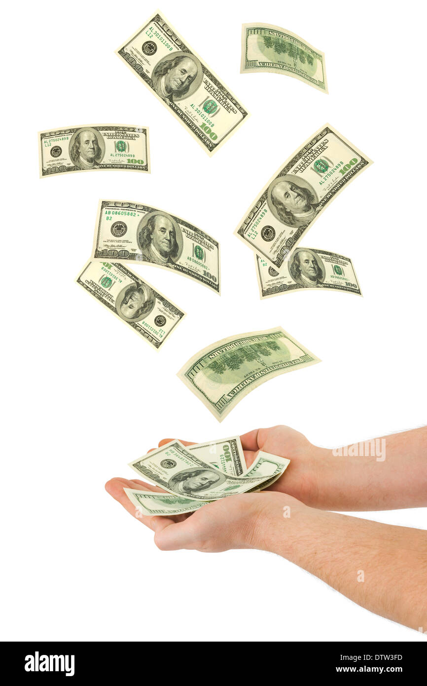 Hand and falling money Stock Photo - Alamy