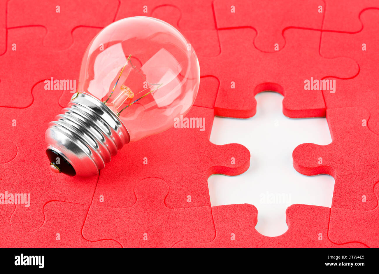 Lamp and puzzle Stock Photo - Alamy