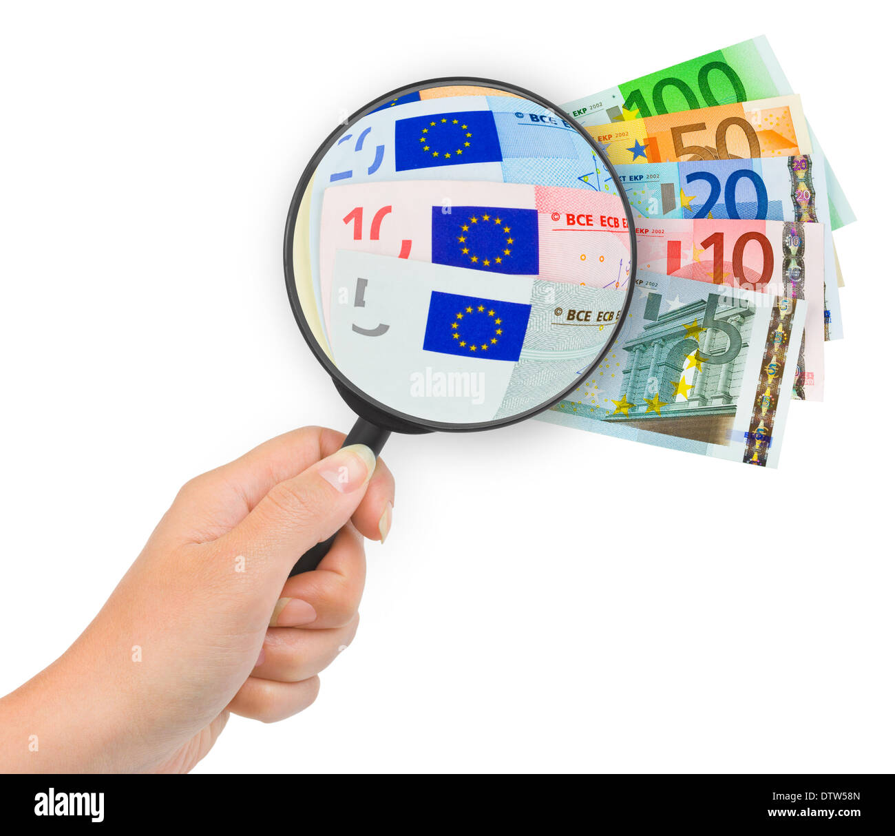 Hand with magnifying glass and money Stock Photo - Alamy
