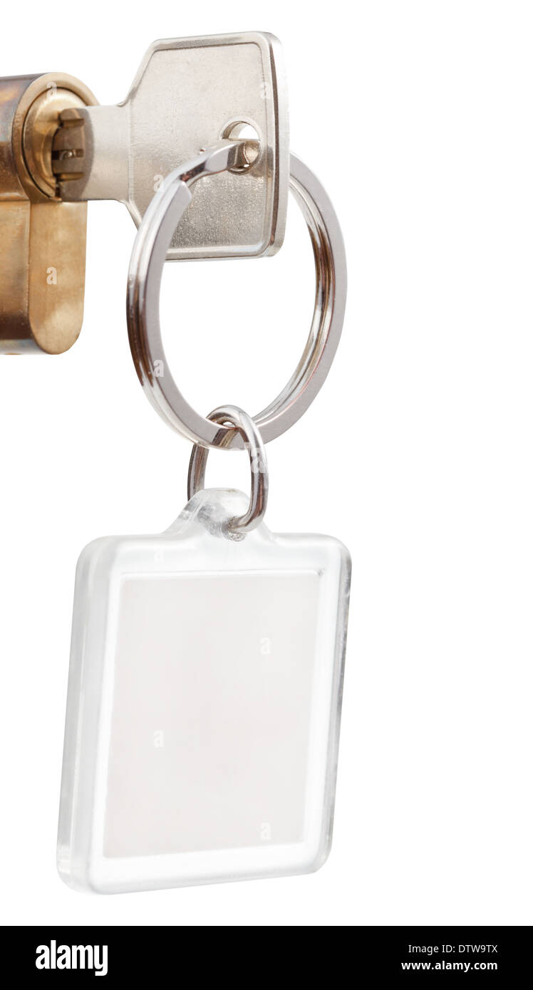 home key with square keychain in cylinder lock close up isolated on ...