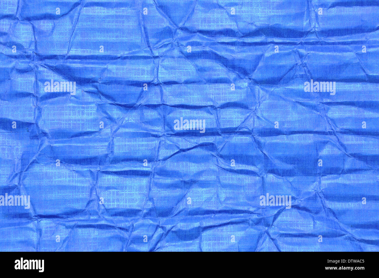 Creased blue carton surface, folded paper Stock Photo - Alamy
