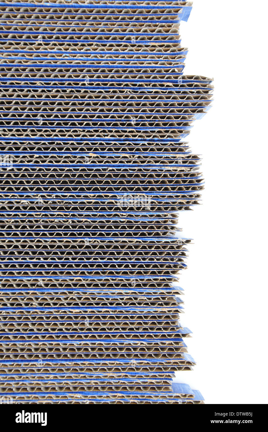 Blue corrugated cardboard isolated on white background Stock Photo - Alamy