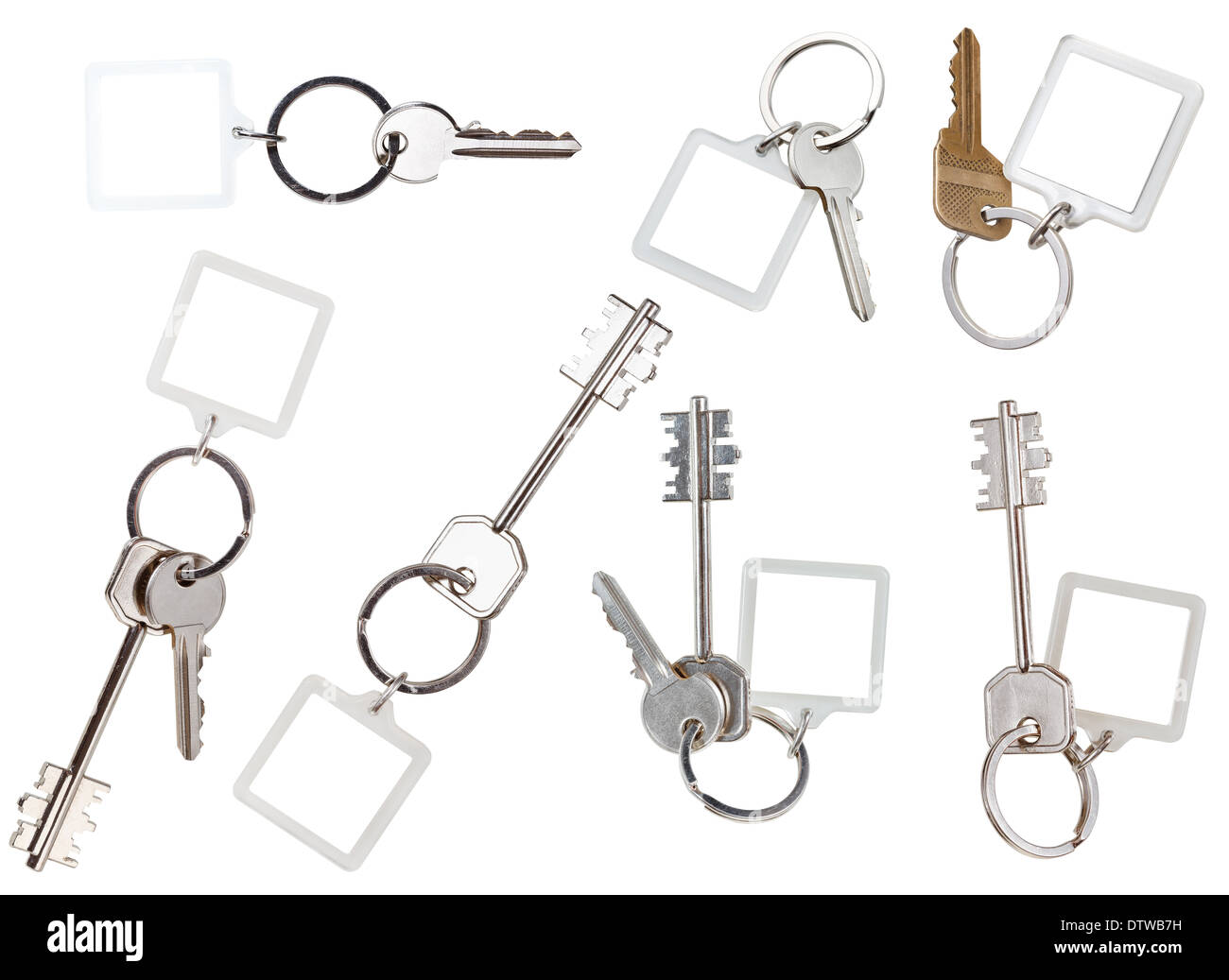 collection of keys on ring with blank keychain isolated on white ...