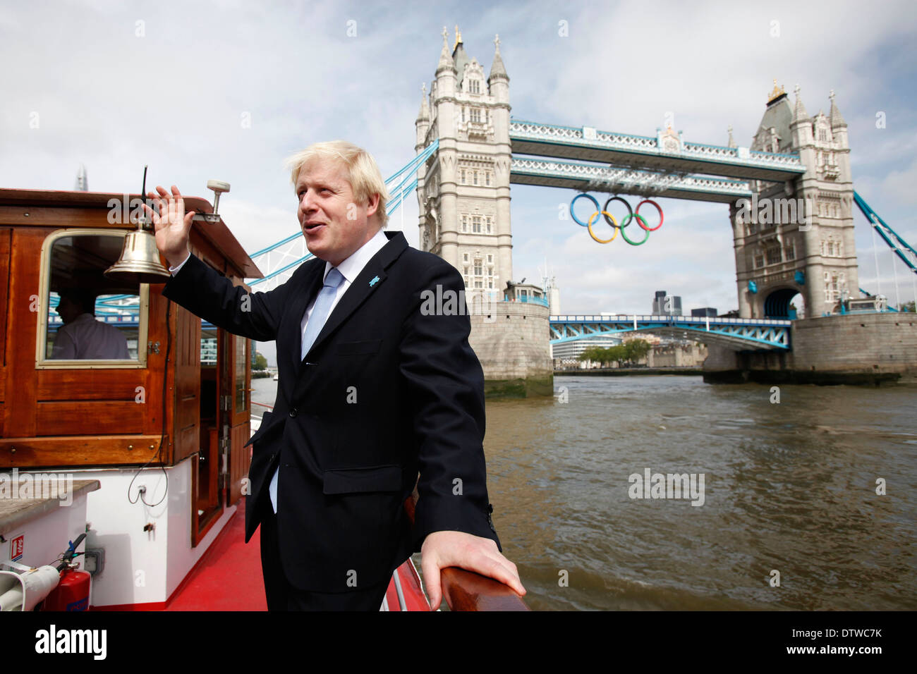 Mayor of London Boris Johnson poses for a photograph as a giant set of ...