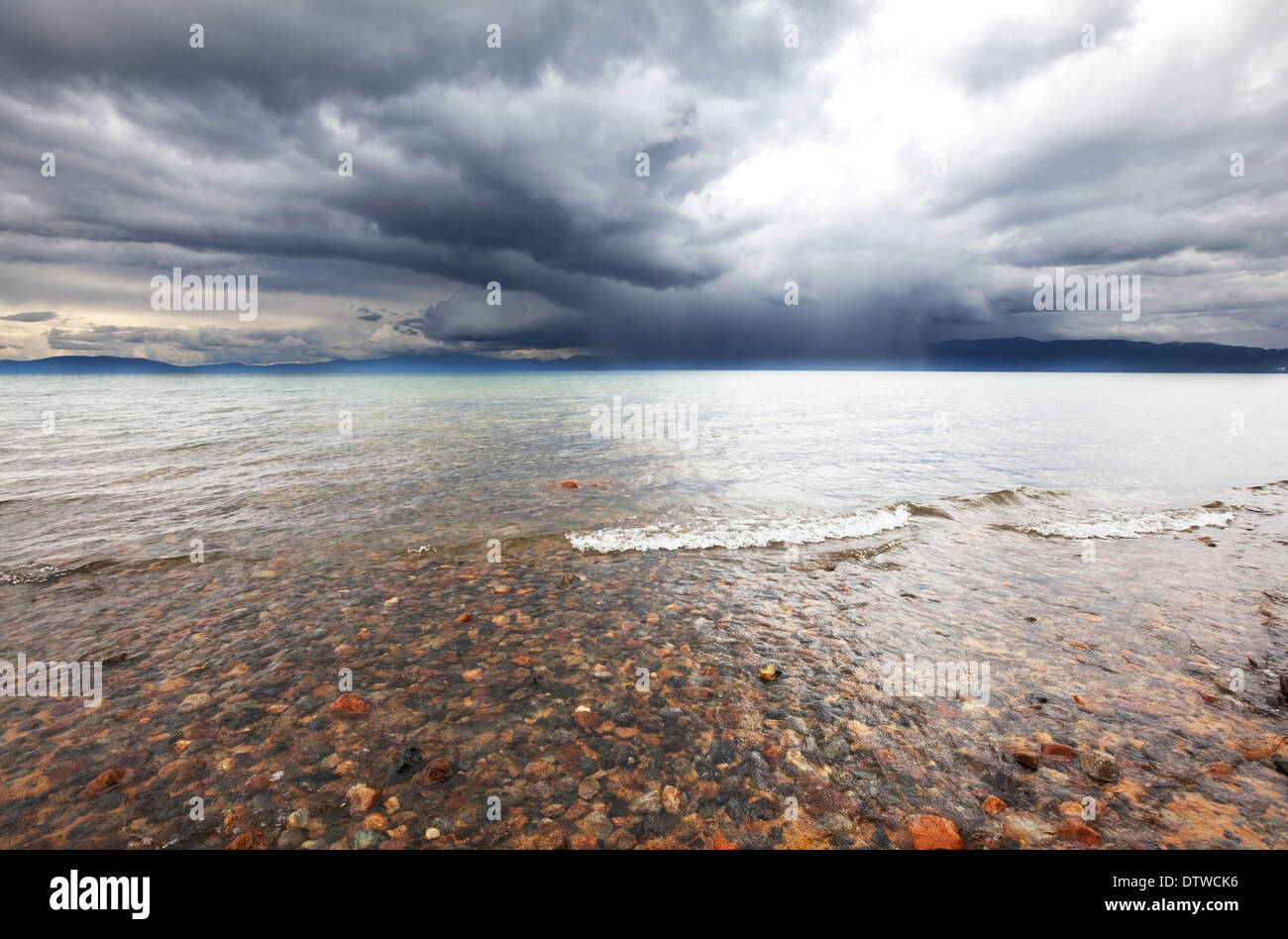 Lake in storm Stock Photo - Alamy