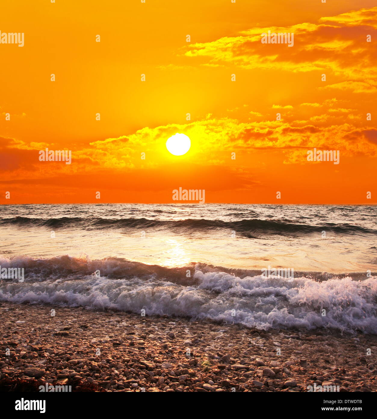 Sea on sunset Stock Photo - Alamy