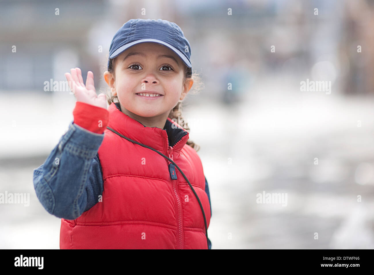 Waving smiling hi-res stock photography and images - Alamy